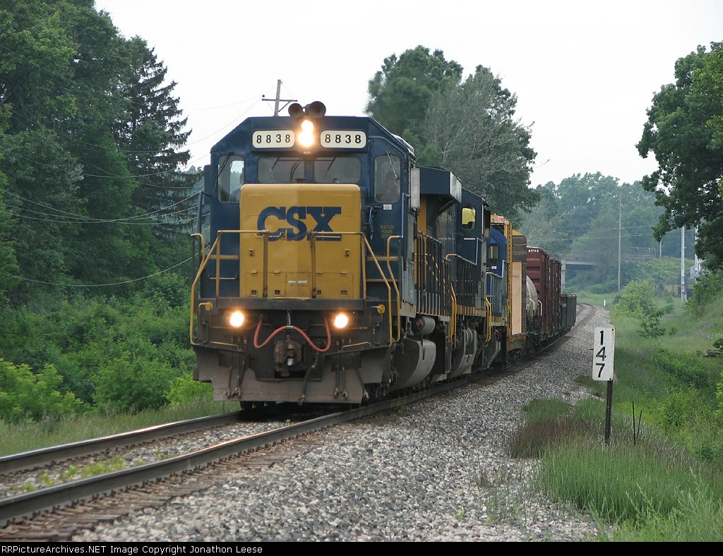 CSX 8838 leading Q326 east past CH 147